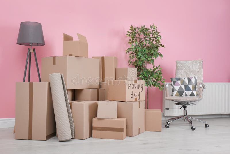 Cardboard Boxes and Household Stuff in Empty Room Stock Photo - Image ...