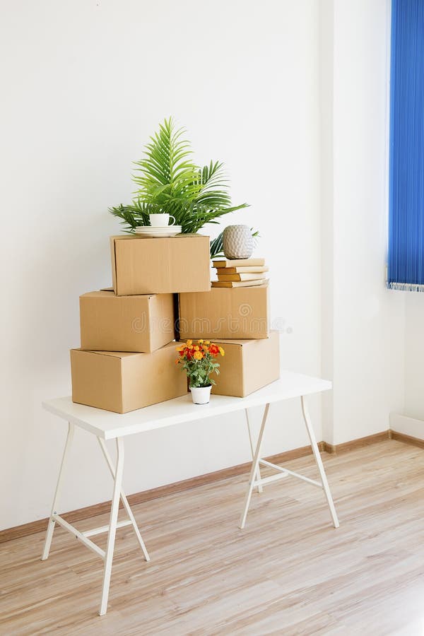 Cardboard Boxes - Moving To a New House Stock Image - Image of people ...