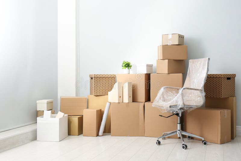 Cardboard Boxes and Packed Chair Indoors. Moving Day Stock Image ...