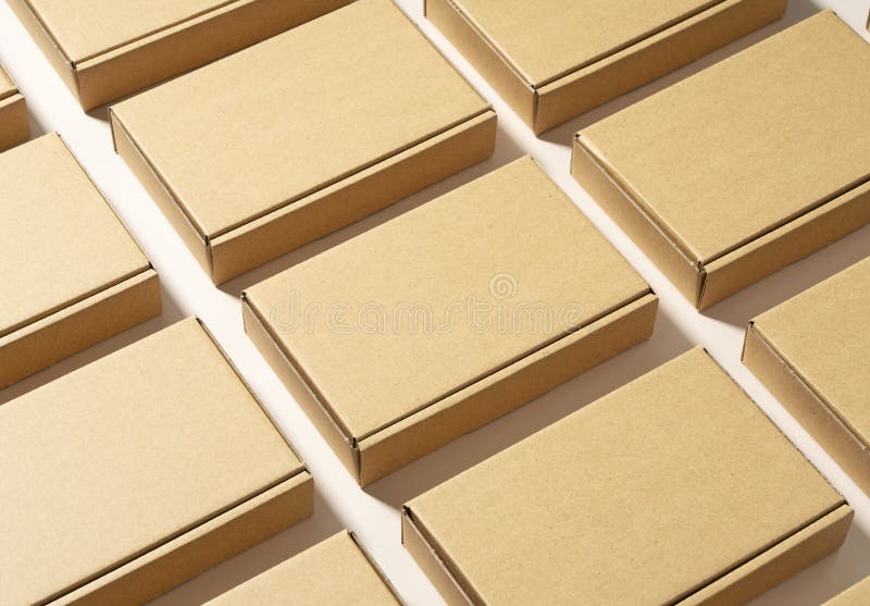 Cardboard Boxes Placed on a Beige Background Stock Photo - Image of ...