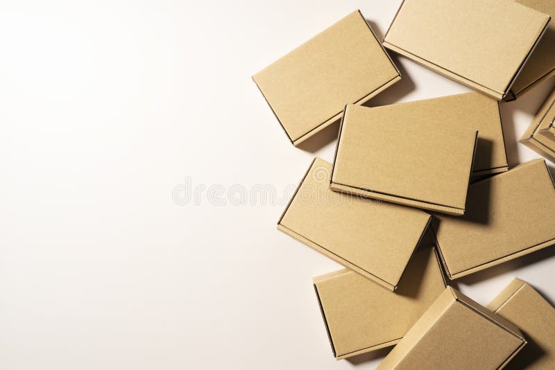 Cardboard Boxes Placed on a Beige Background Stock Photo - Image of ...