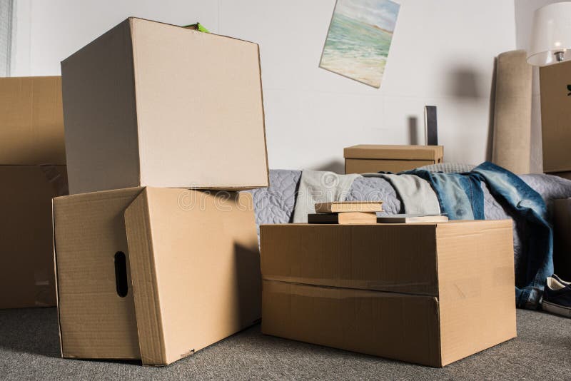 Cardboard boxes in room stock photo. Image of casual - 119751910