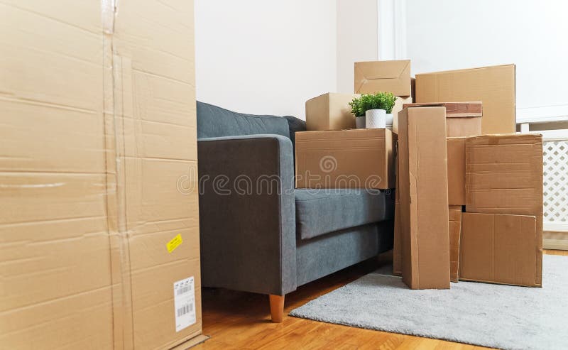 Cardboard boxes in room. stock photo. Image of home - 214092954