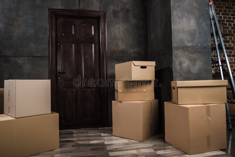 Cardboard boxes in room stock image. Image of still - 119751847