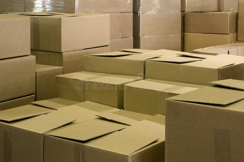Cardboard Boxes in a Storage and Shipping Warehouse Stock Image - Image ...