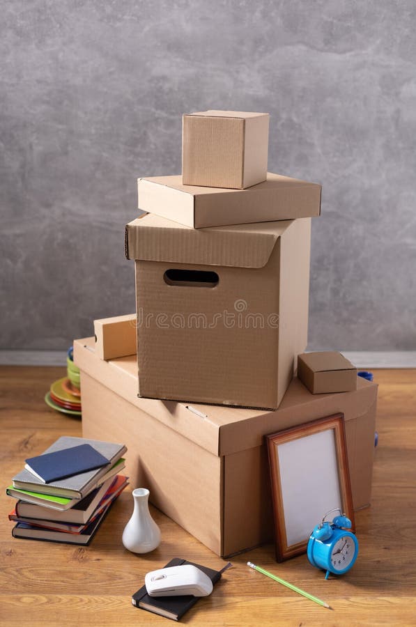 Cardboard Boxes and Things for Moving To New Home. Stack of Cardboard ...