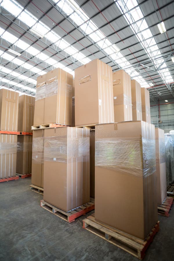 Cardboard Boxes in Warehouse Stock Photo - Image of shipping ...