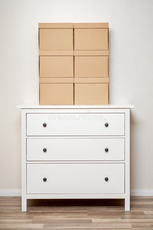 Cardboard Boxes on White Wooden Commode Stock Photo - Image of fragile ...