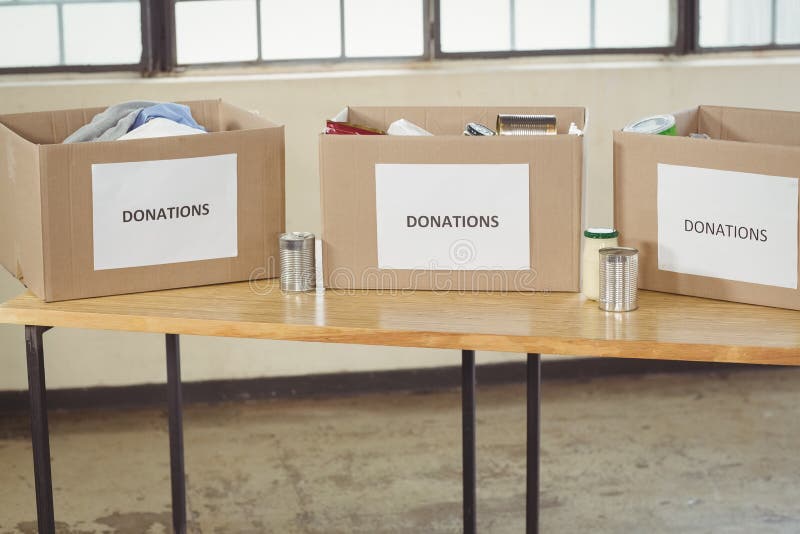 Cardboard Donation Boxes on Table Stock Image - Image of products ...