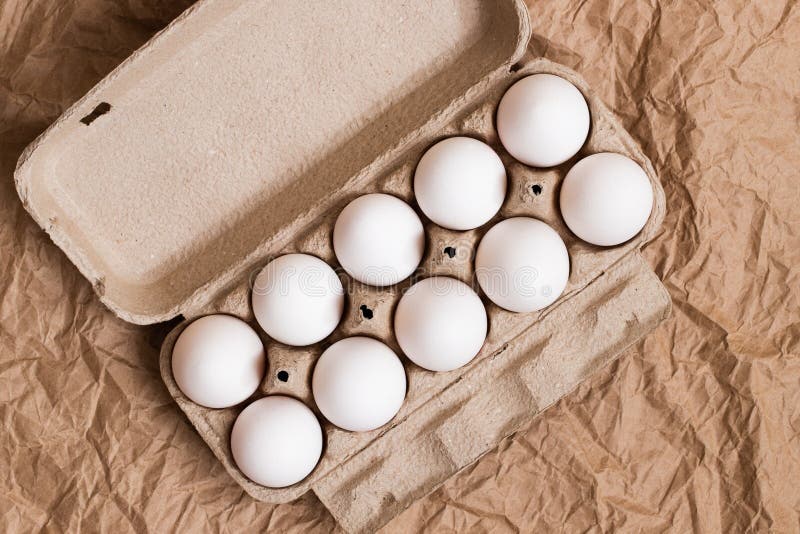 Cardboard Egg Rack with Eggs on Paper Top View Stock Photo - Image of ...