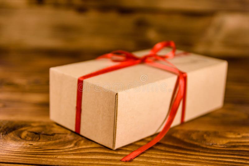 Cardboard Gift Box on a Wooden Table Stock Photo - Image of drink, food ...