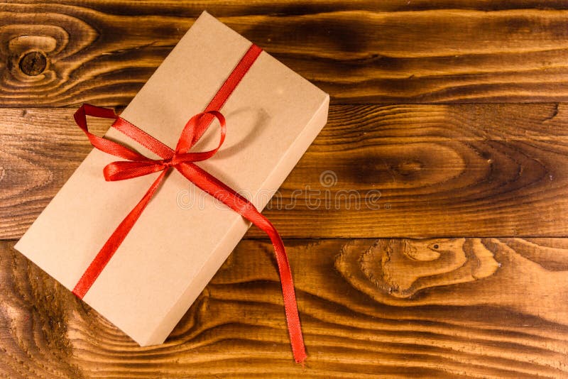 Cardboard Gift Box on a Wooden Table. Top View Stock Photo - Image of ...