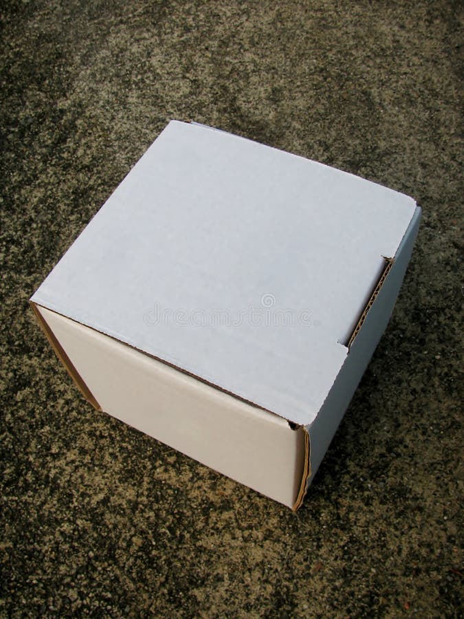 Cardboard Mailing Box on Concrete Floor Stock Image - Image of object ...