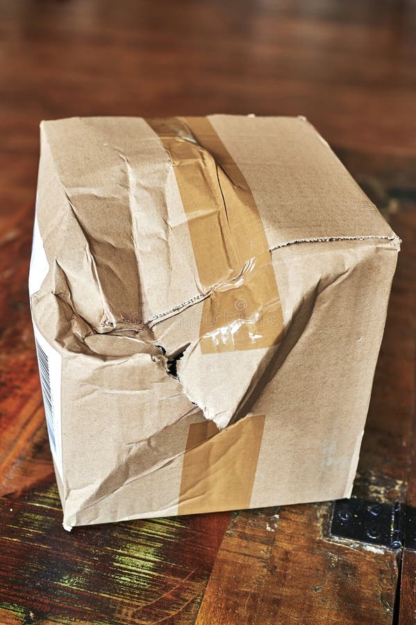 Cardboard Package that Was Damaged in Shipping Stock Photo - Image of ...