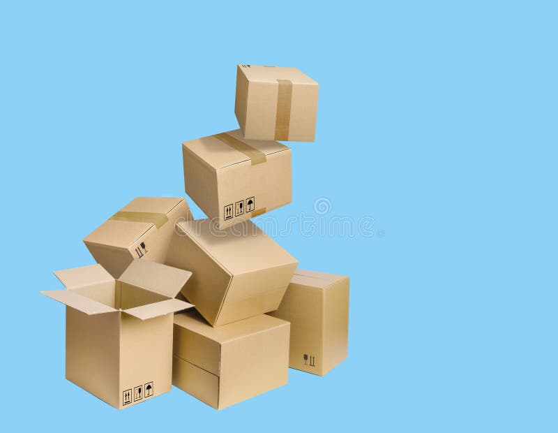 Cardboard Parcel Boxes Falling on Blue Background Stock Image - Image ...
