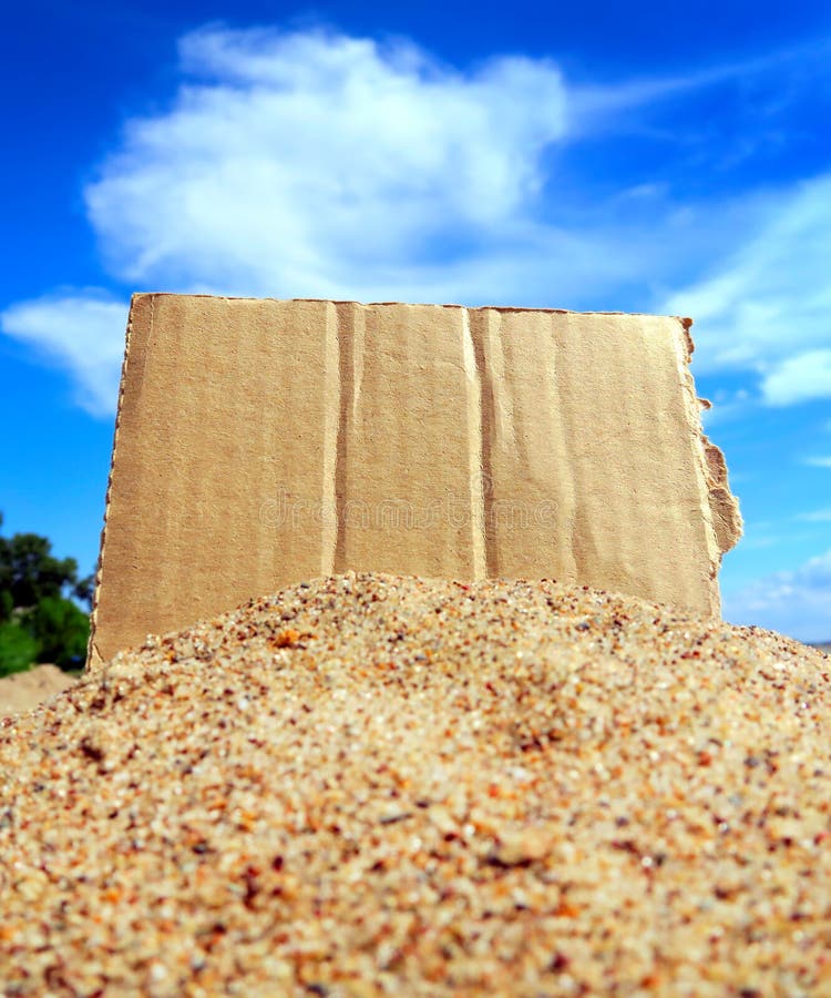 Cardboard in the Sand stock image. Image of card, nature - 56012581