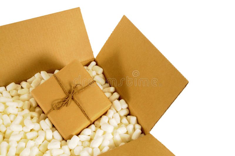 Cardboard Shipping Box with Small Wrapped Package Inside Stock Image ...