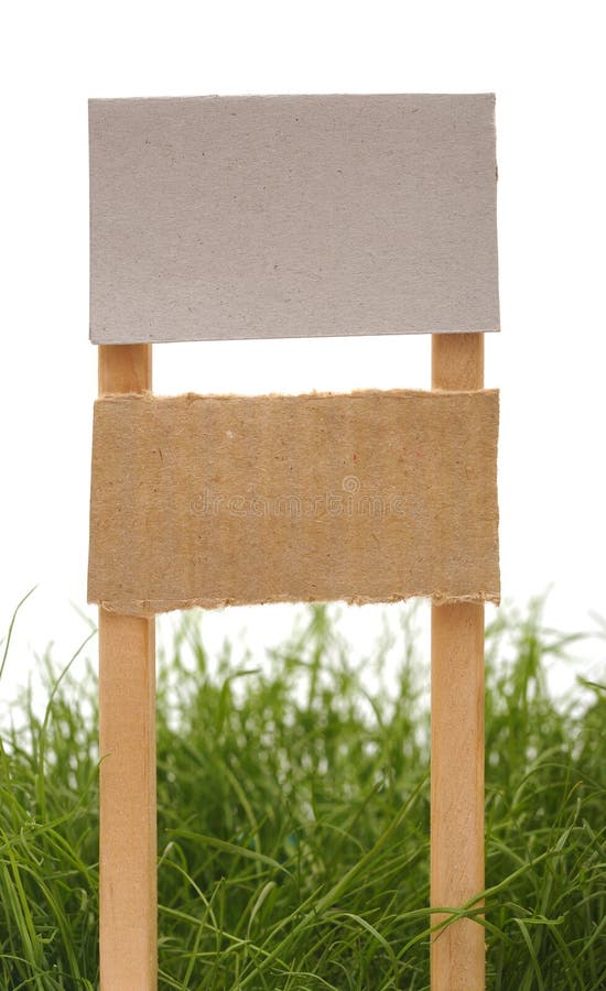 Cardboard sign with grass stock photo. Image of private - 19486344