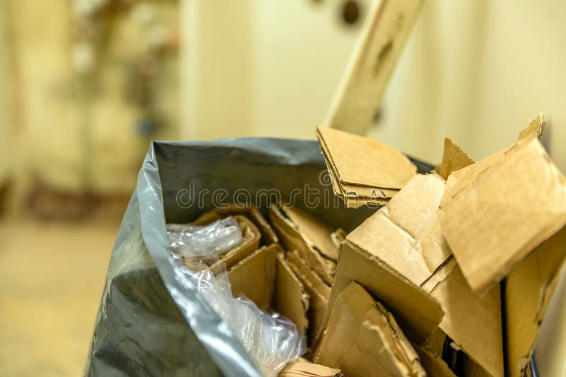 Cardboard Waste in Plastic Bag on Construction Site Stock Image - Image ...