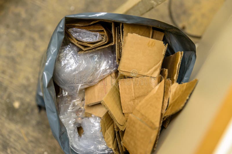 Cardboard Waste in Plastic Bag on Construction Site Stock Image - Image ...