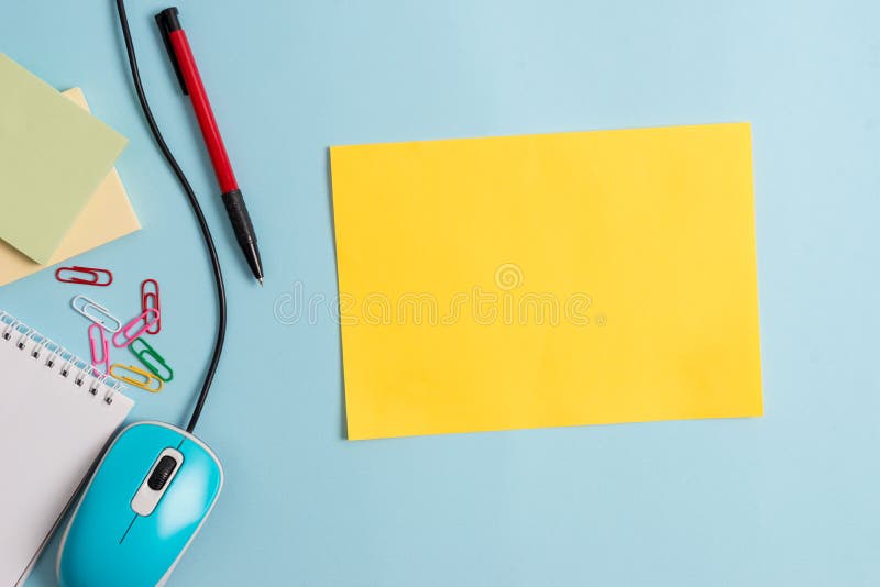 Cardboard and Writing Equipment with Modern Gadget Above Pastel ...