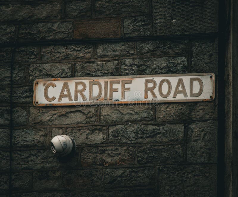 Cardiff Road Street Sign Mounted on a Brick Wall. Stock Illustration ...