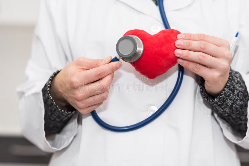 Cardiologist Doctor. Checking Heart with Stethoscope Stock Photo ...