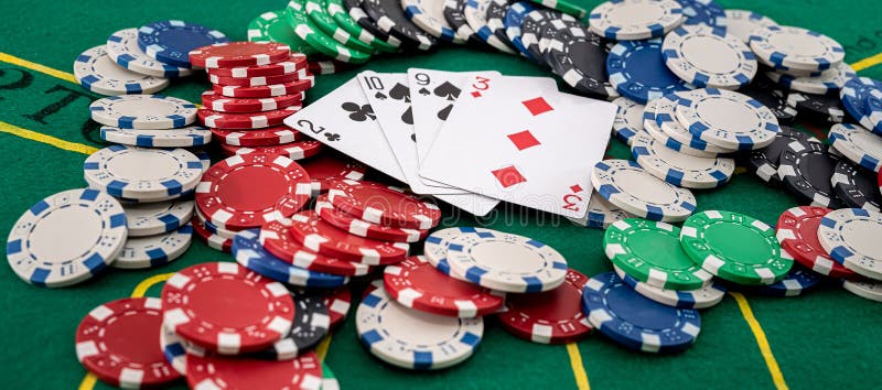 Cards and Colored Chips are Scattered on the New Green Poker Table ...