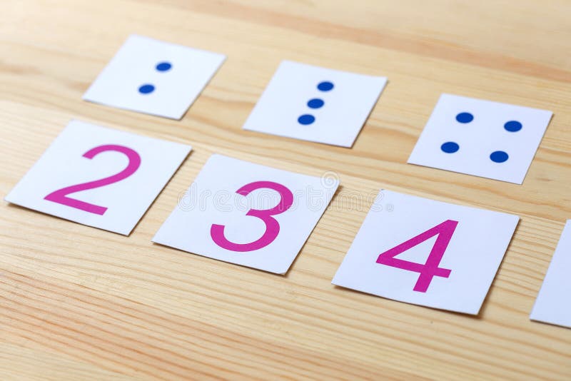 The Child Spreads Cards with Numbers To Cards with Dots. the Study of ...