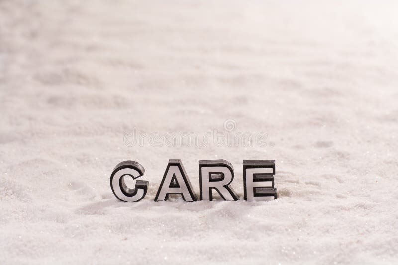 Care word on white sand stock image. Image of prevention - 119345395