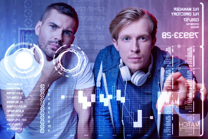 Careful Man Pointing To the Screen and His Friend Looking Interested ...