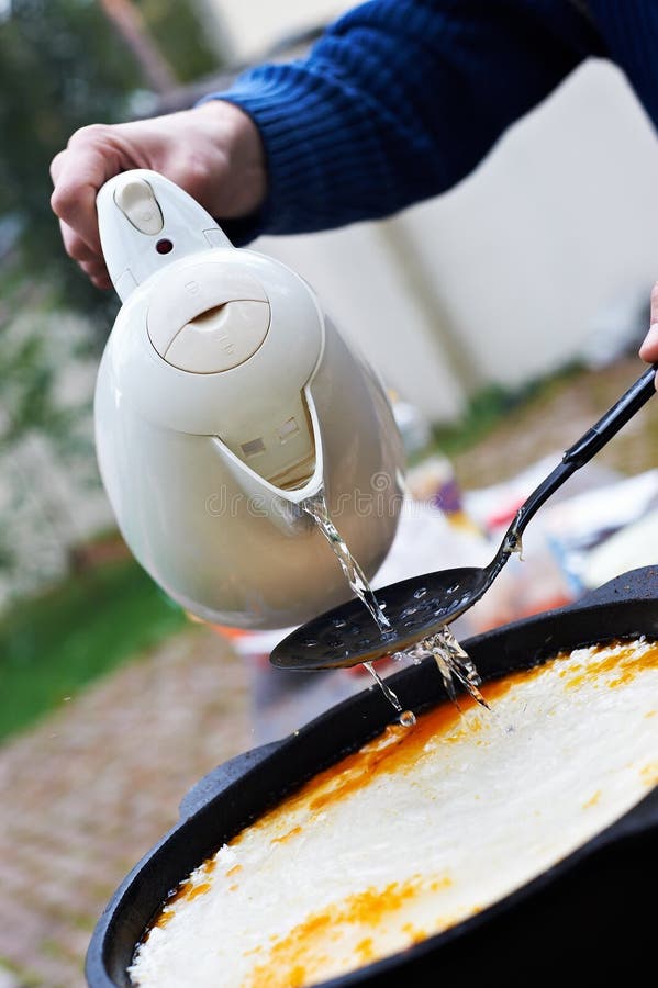 Careful Pouring Water on the Rice Pilaf Stock Photo - Image of dinner ...