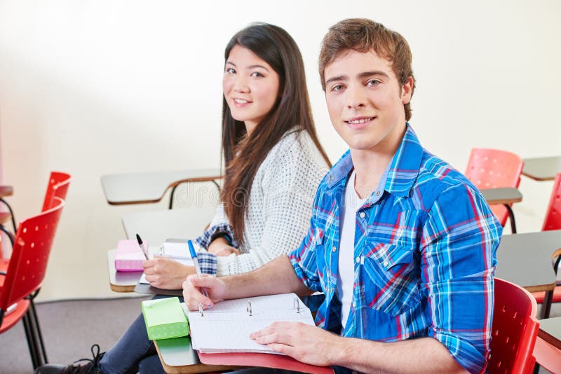 Students smiling in class stock image. Image of seminar - 21304575