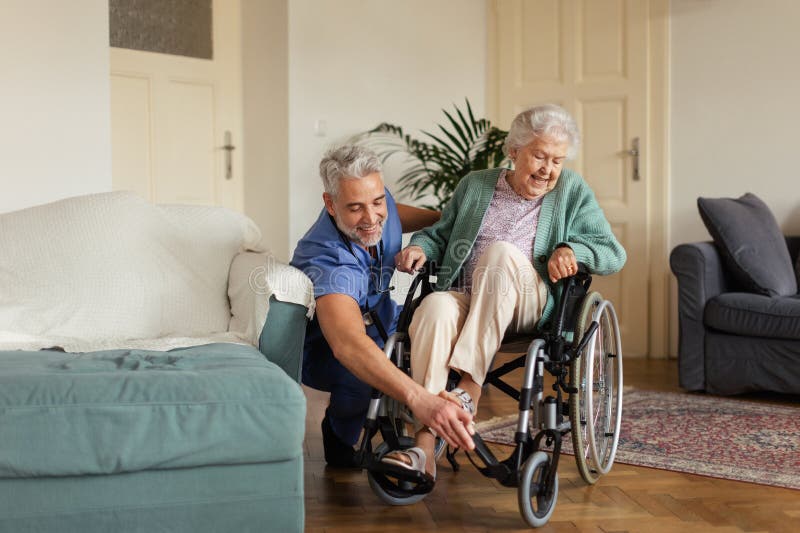 Caregiver Doing Regular Check-up of Senior Woman in Her Home. Stock ...