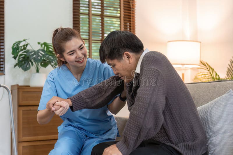 Caregiver or Nurse Help Support Elderly are Standing Up without Walker ...