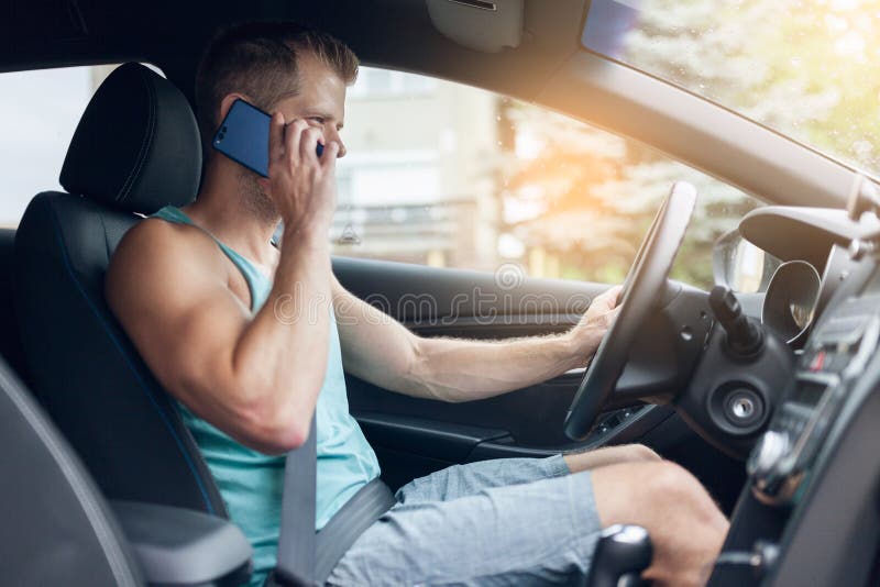 Careless Driver Using a Mobile Phone Whilst Driving Stock Photo - Image ...
