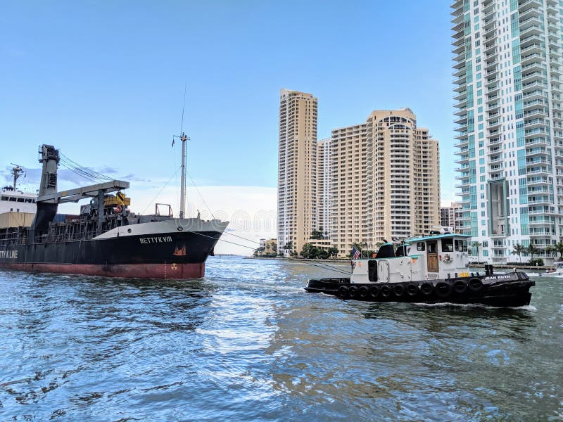 A Cargo Boat Entering the City Editorial Photography - Image of city ...