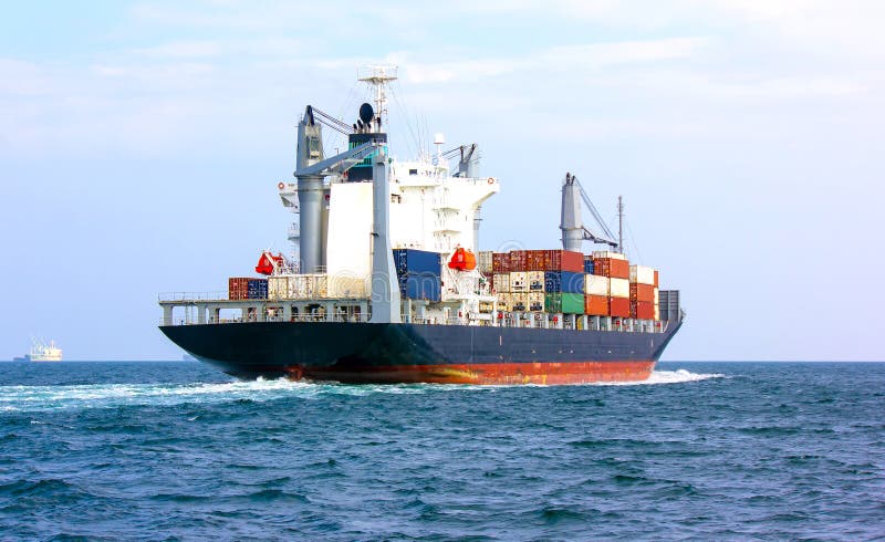 Cargo boat and small boat stock image. Image of tugboat - 89579513