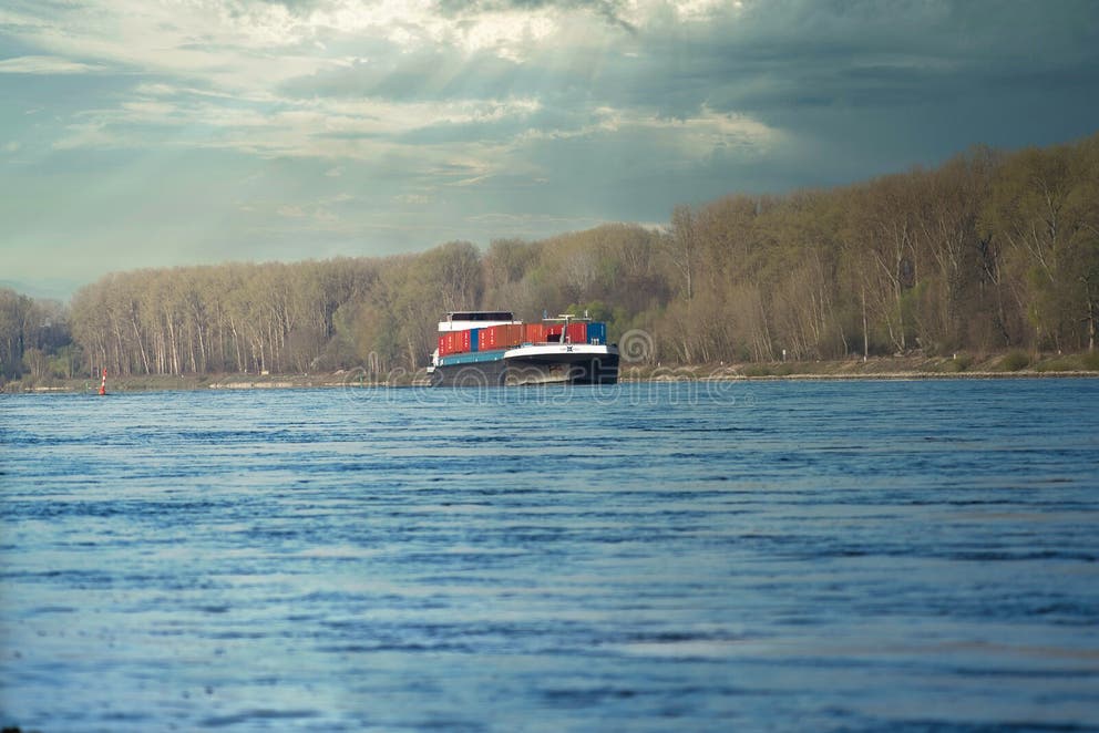 A Cargo Container Ship - Freighter Navigating River Stock Image - Image ...