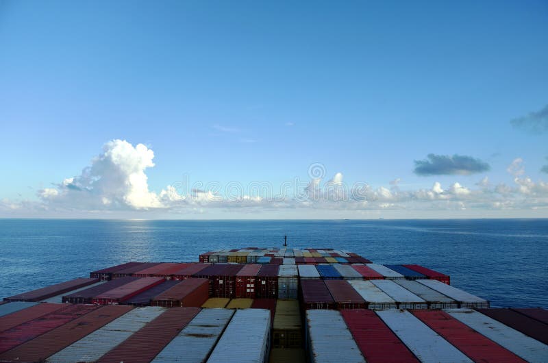Large Cargo Container Ship Sailing through Calm Sea. Stock Photo ...