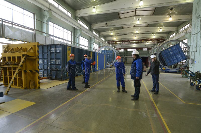 Cargo Containers Set in a Frames of Rotating Machines for Repairing ...
