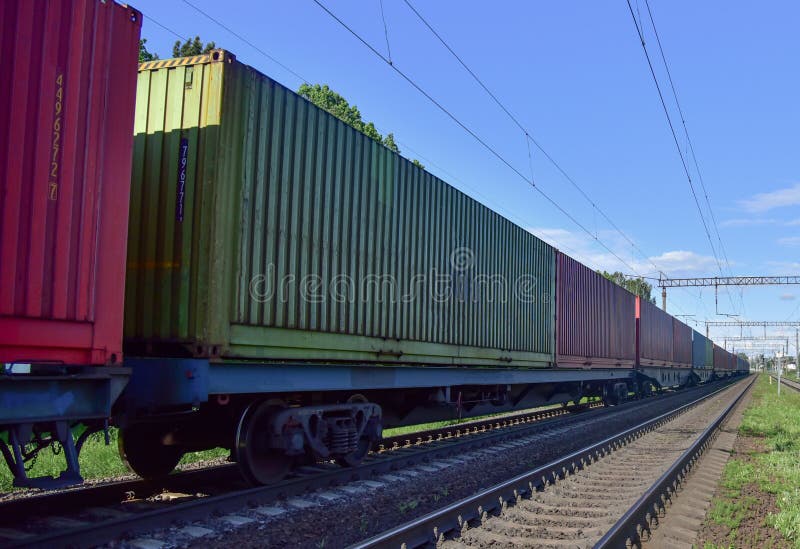Cargo Containers Transportation on Freight Train by Railway. Intermodal ...