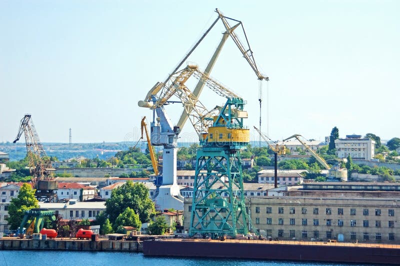 Cargo crane at harbor stock image. Image of machinery - 28762219