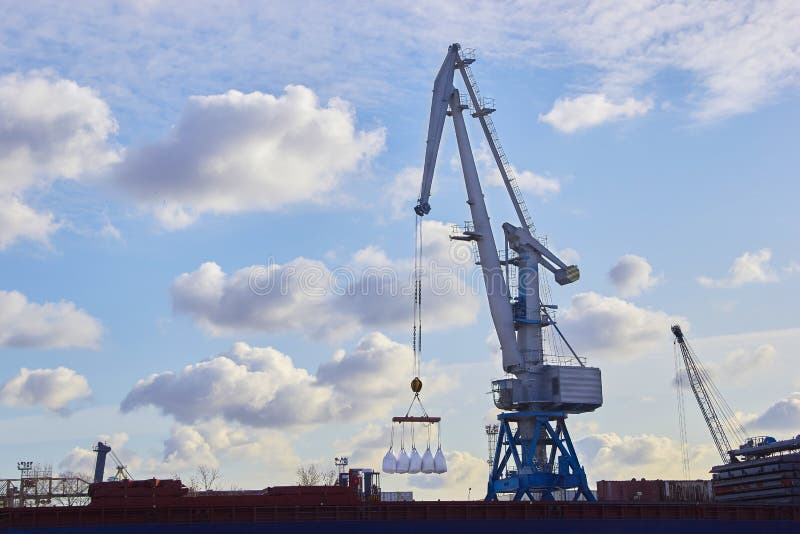 Cargo Crane for Loading Raw Materials on Sea Vessels Stock Photo ...