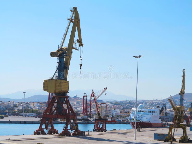 Cargo Cranes and Ship in the Sea Port Over Blue Sky Stock Photo - Image ...