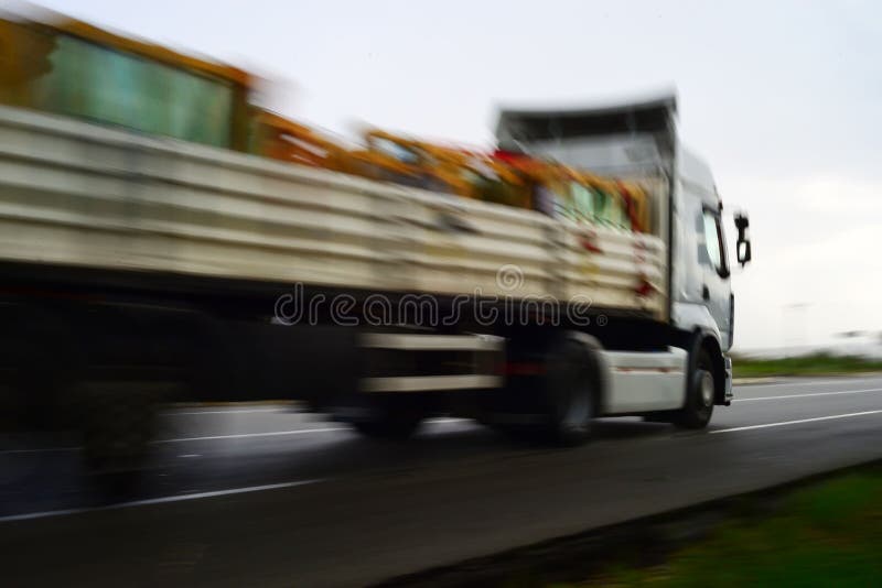 Cargo Industrial Truck in Motion Fast on a Highway Stock Image - Image ...
