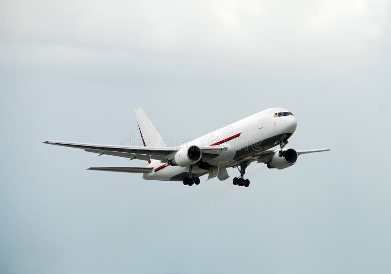 Cargo aircraft in flight stock photo. Image of shipment - 3370496