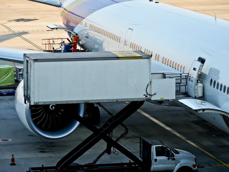 Loading Cargo Onto Aircraft Stock Image - Image of cargo, truck: 626733