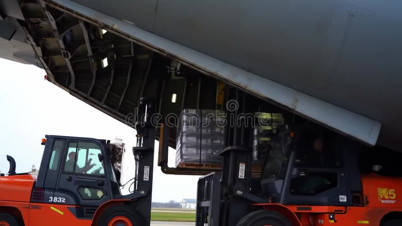 Cargo Loading Process at the Airport Using a Forklift and Large ...