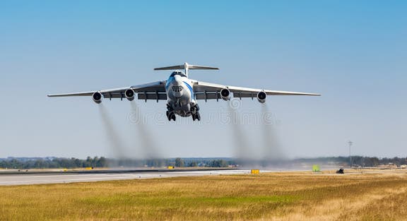 A Cargo Plane Taking Off from the Runway at the Airport Stock Photo ...